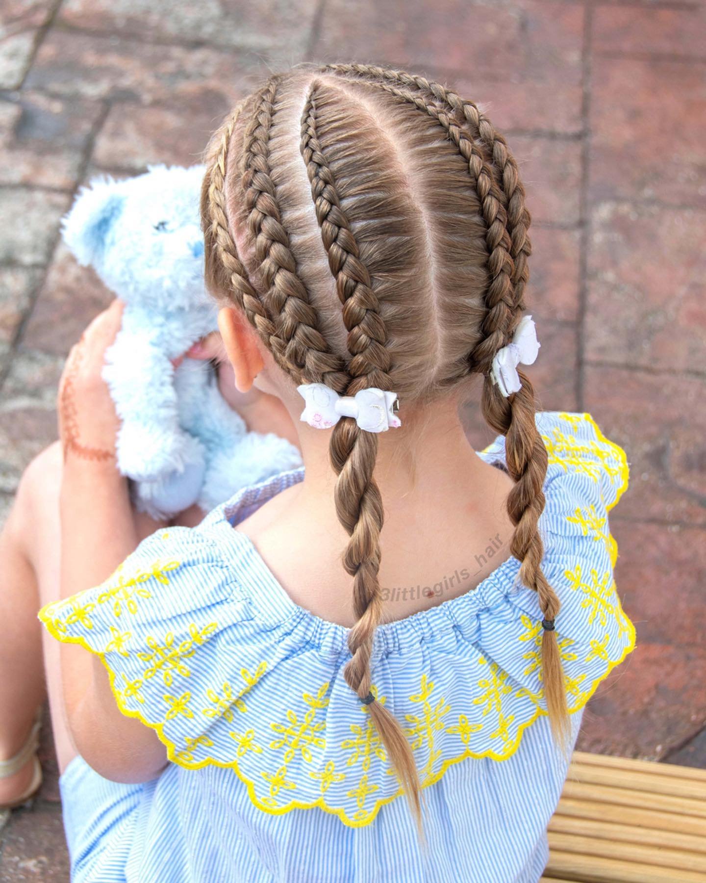 15 Splashy Swimming Pool Hairstyles You Need to Try This Summer 2025